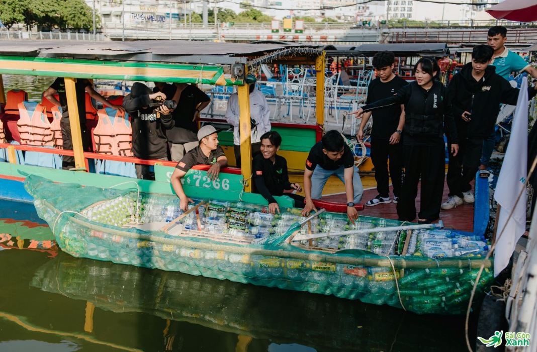 Boat made of recycled materials used to clean up canals - The Saigon Times